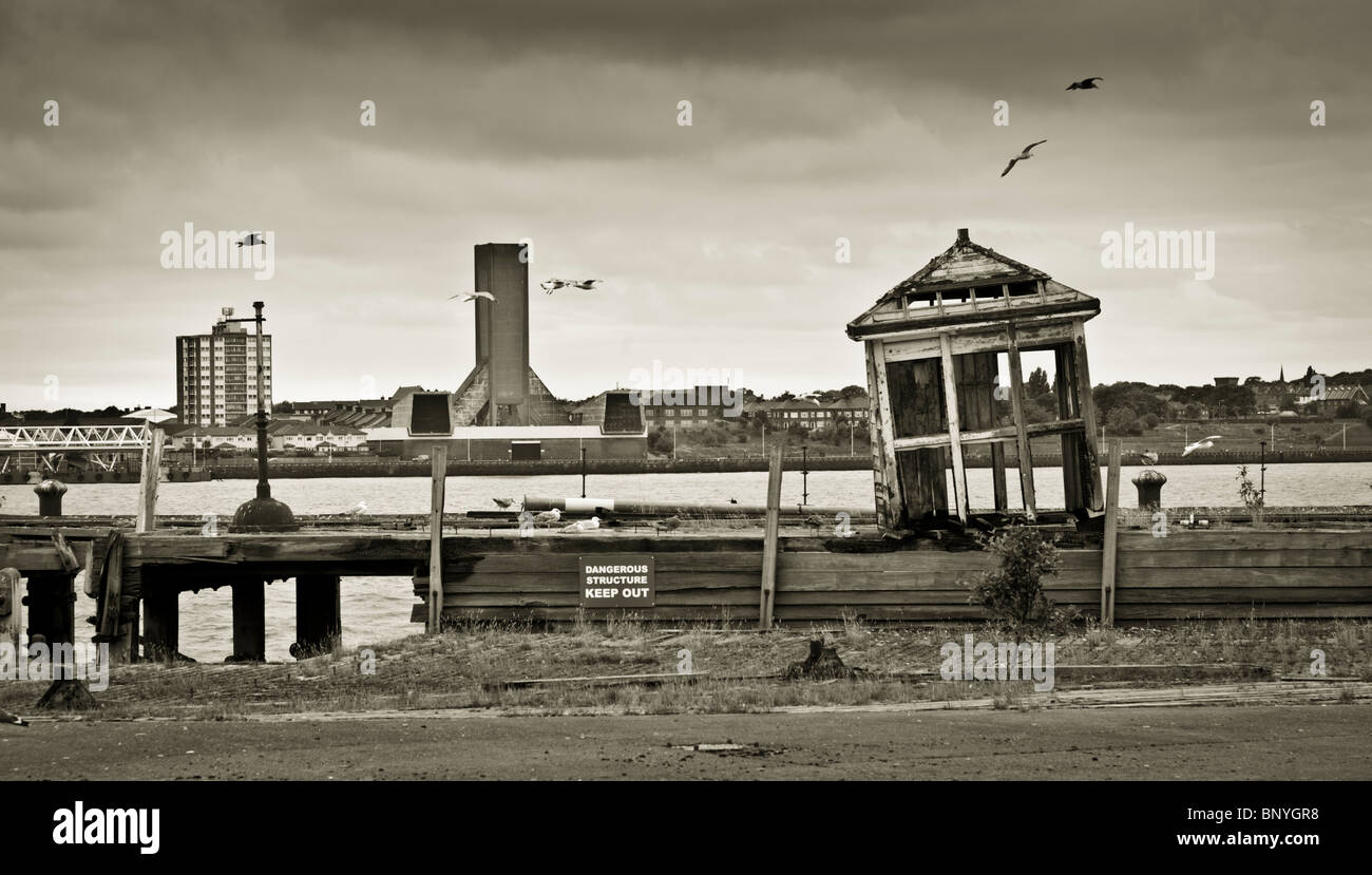 A decaying wooden structure on the waterfront Stock Photo - Alamy