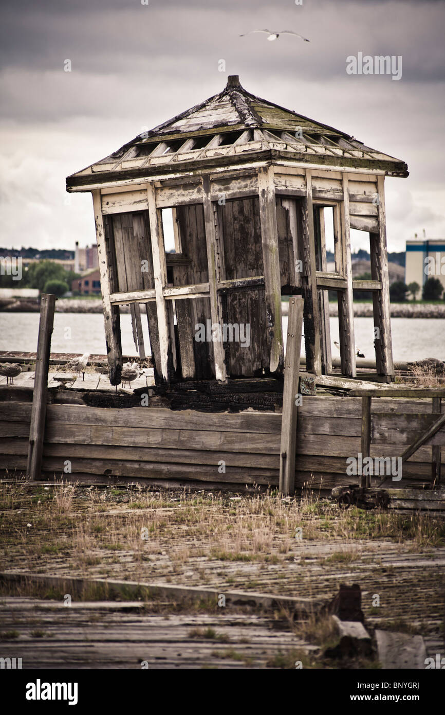 A decaying wooden structure on the waterfront Stock Photo - Alamy