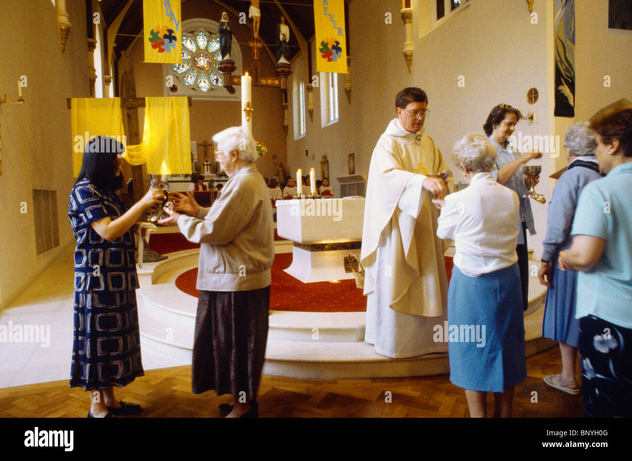 Receiving communion catholic hi-res stock photography and images - Alamy