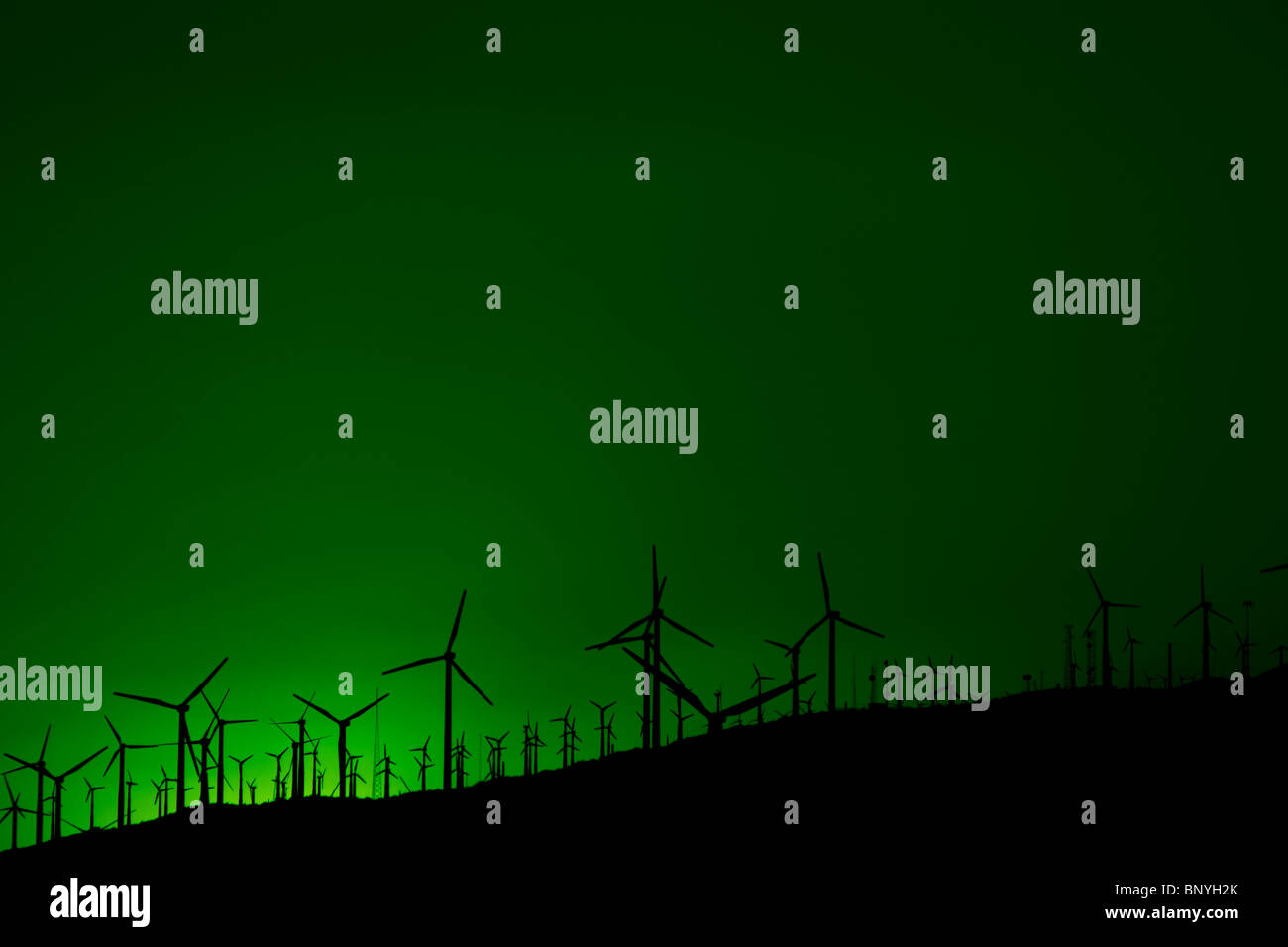Wind turbines with different colored background colors Stock Photo - Alamy