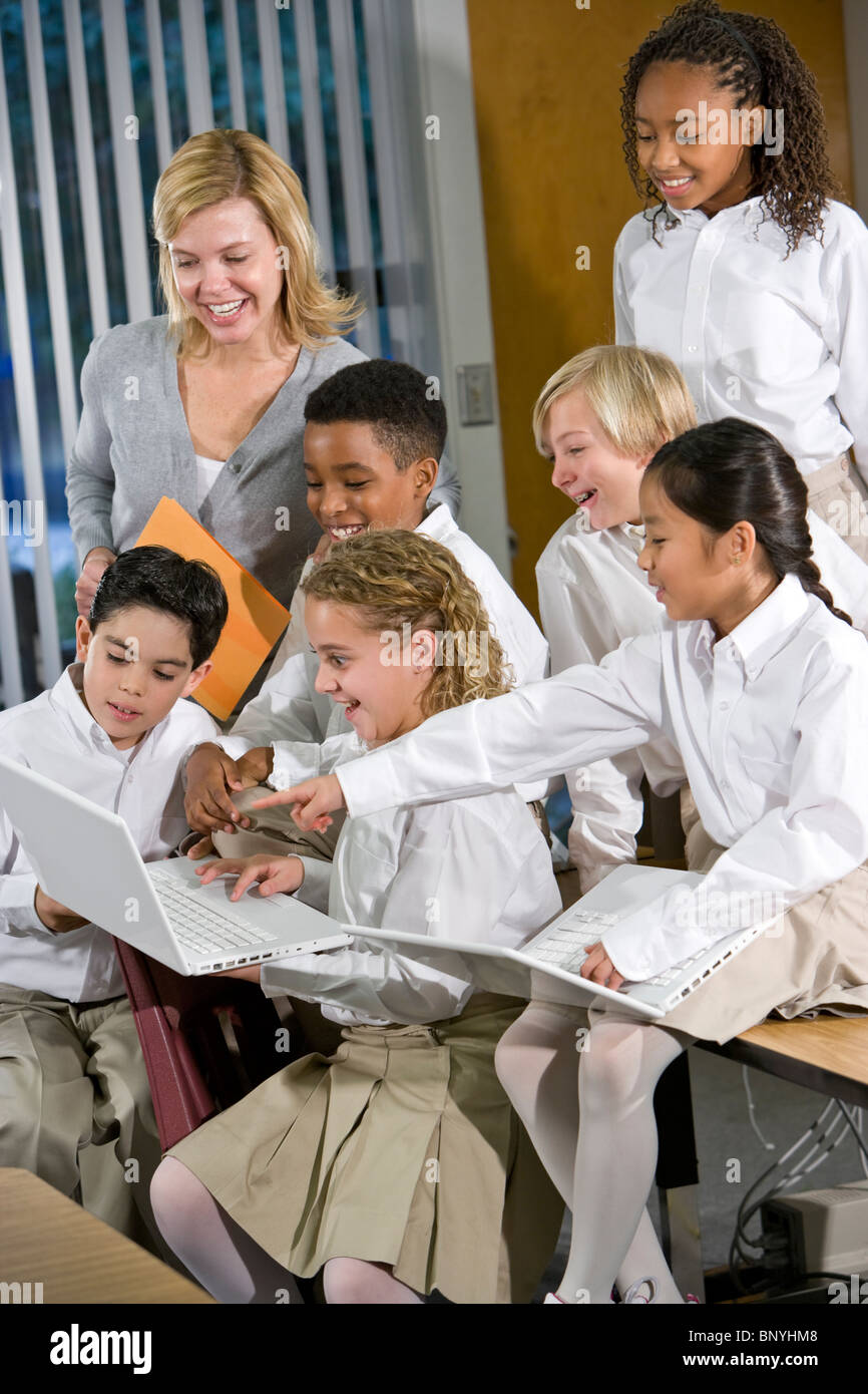 School laptops teacher uniform hi-res stock photography and images - Alamy