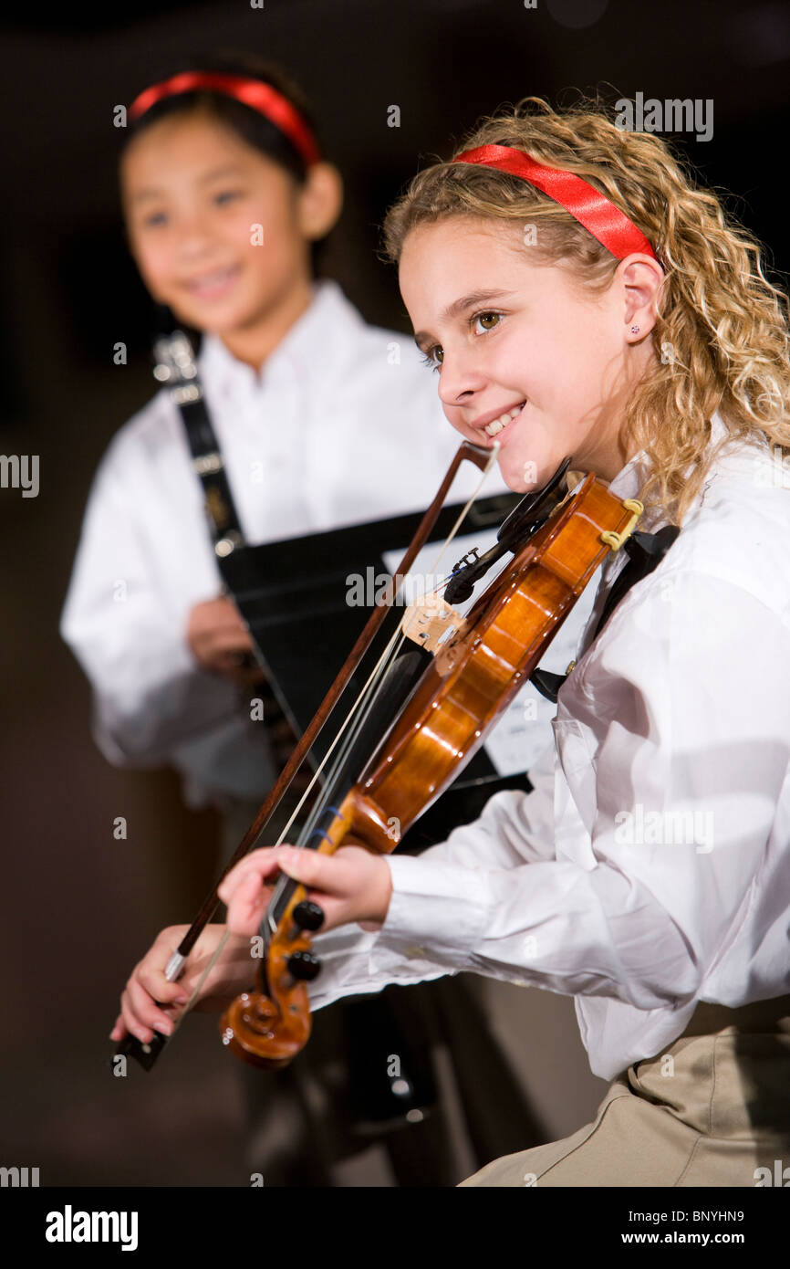 Children playing musical instruments hi-res stock photography and ...