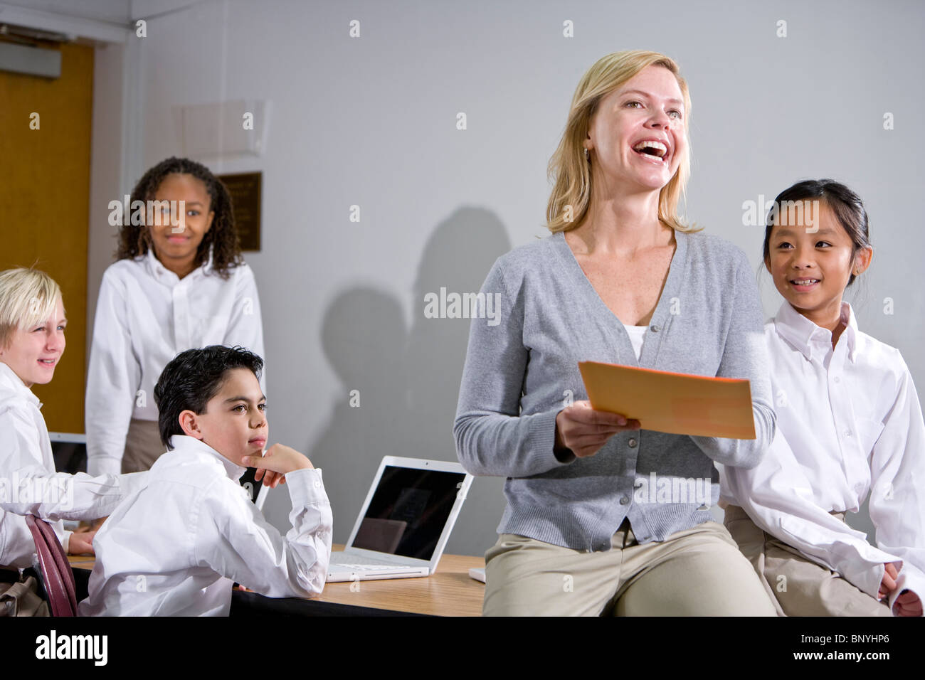 Diverse elementary school class students with teacher Stock Photo - Alamy