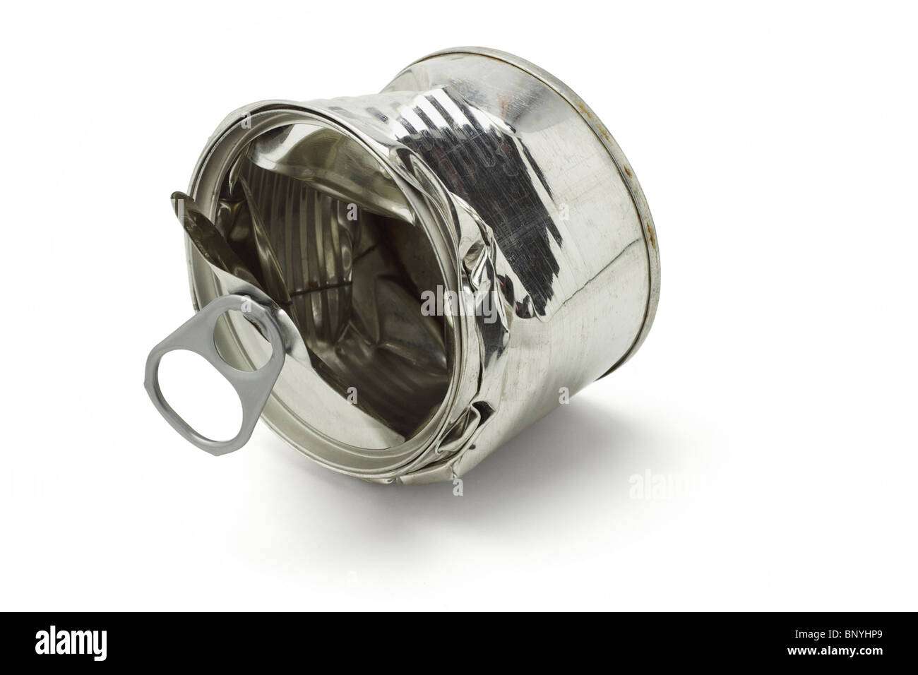Crushed open tin can lying on white background Stock Photo - Alamy