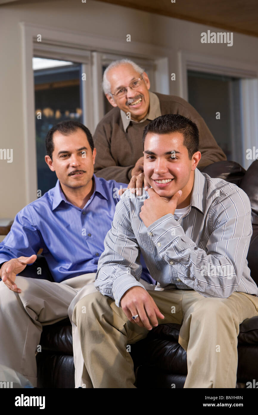Three generations, Hispanic family at home together Stock Photo - Alamy