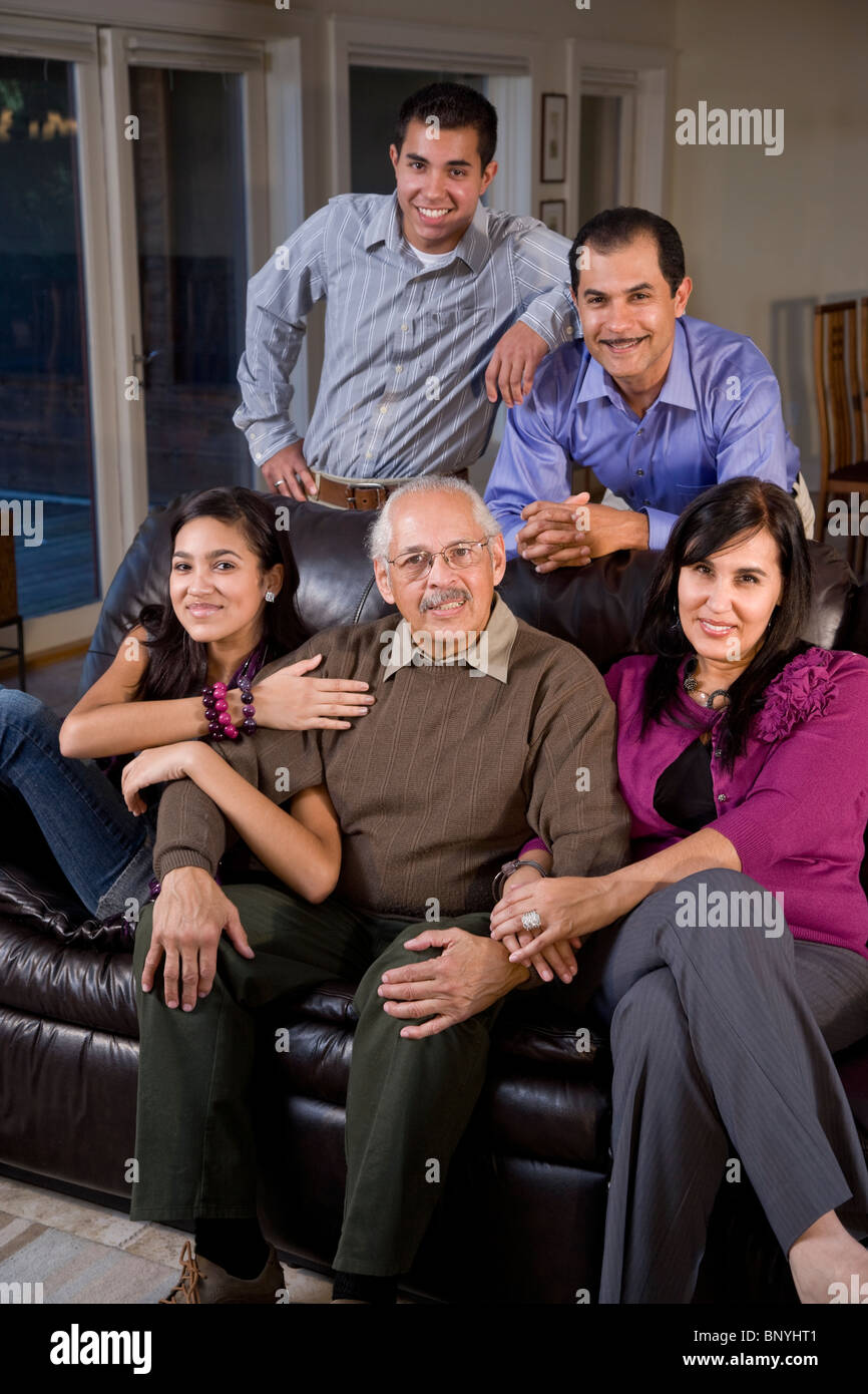 Hispanic family portrait, three generations at home Stock Photo - Alamy