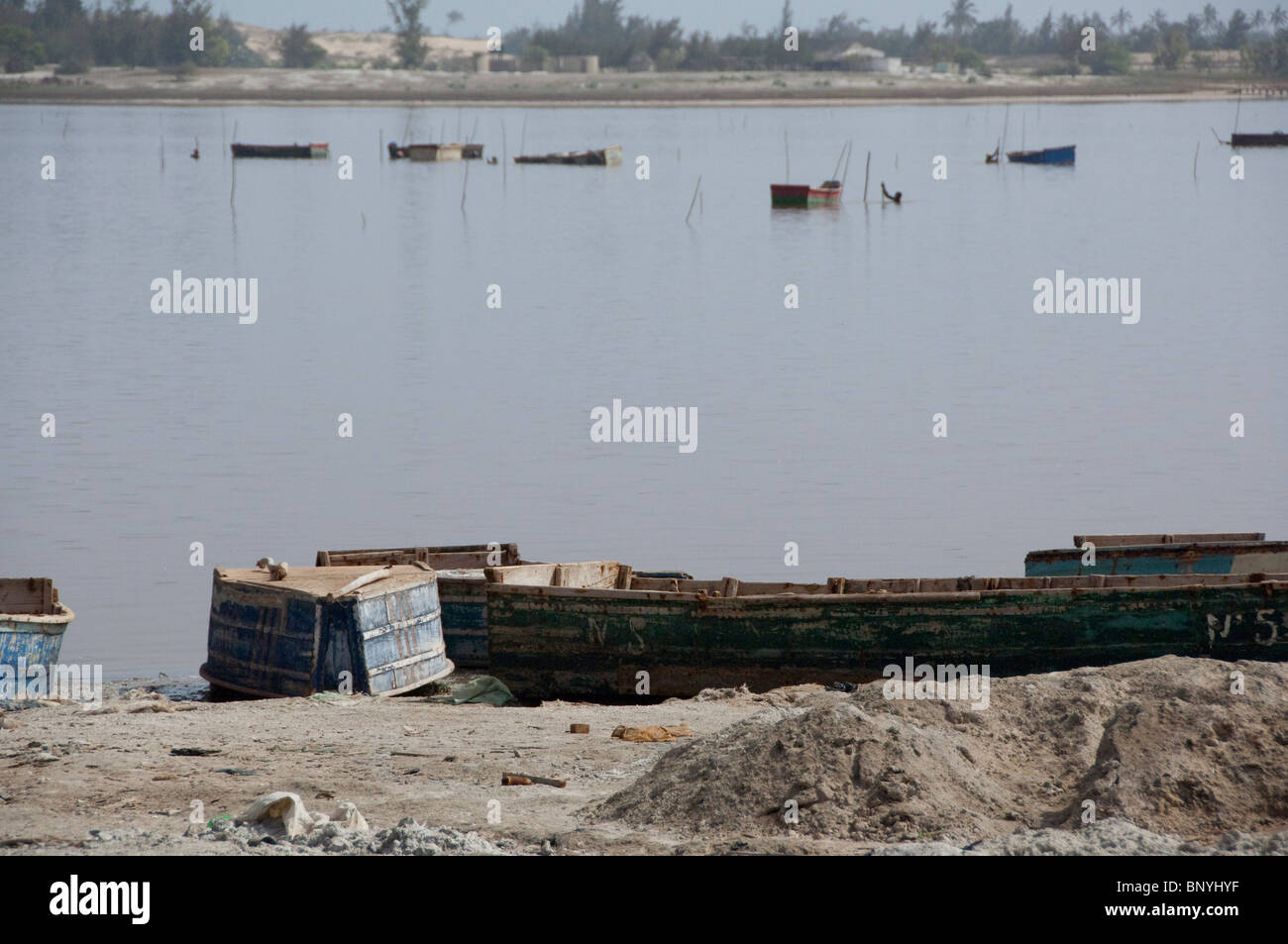 Africa, Senegal, Dakar. The Pink Lake of Retba. Salt gathering boats ...