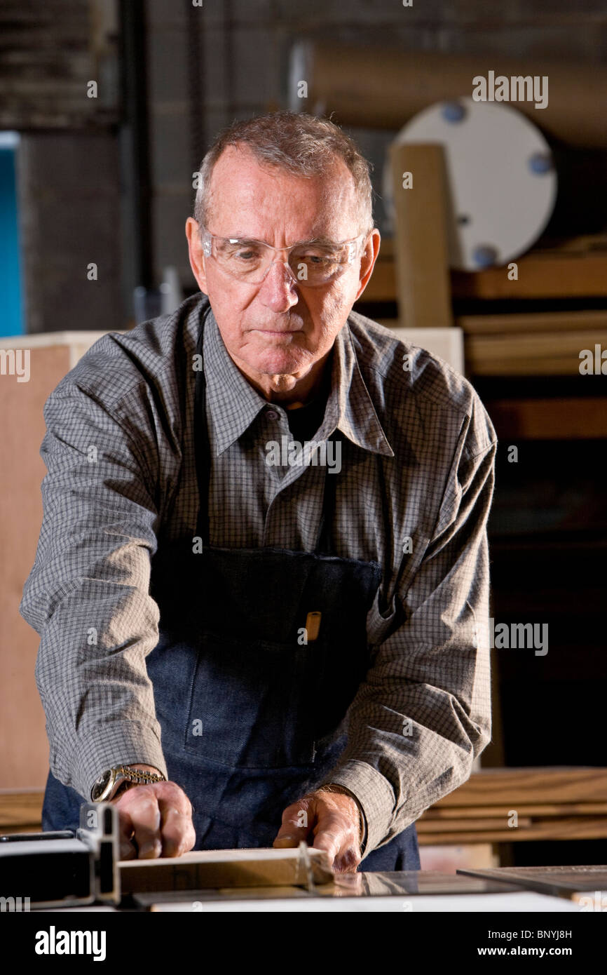 Sawing in half hi-res stock photography and images - Alamy