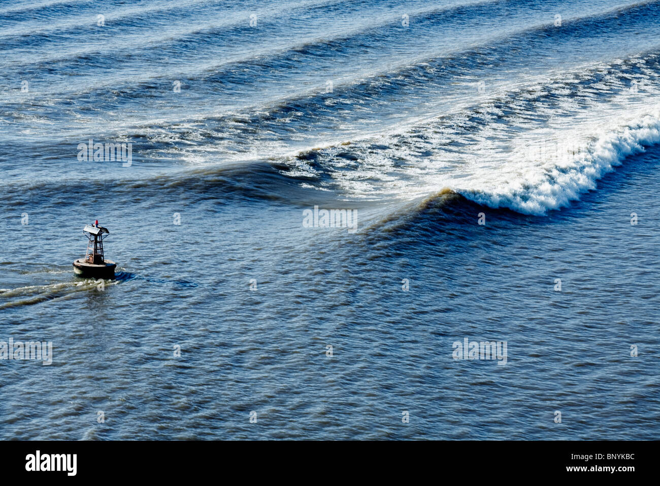 buoy floating in ocean next to waves Pacific Ocean Stock Photo - Alamy