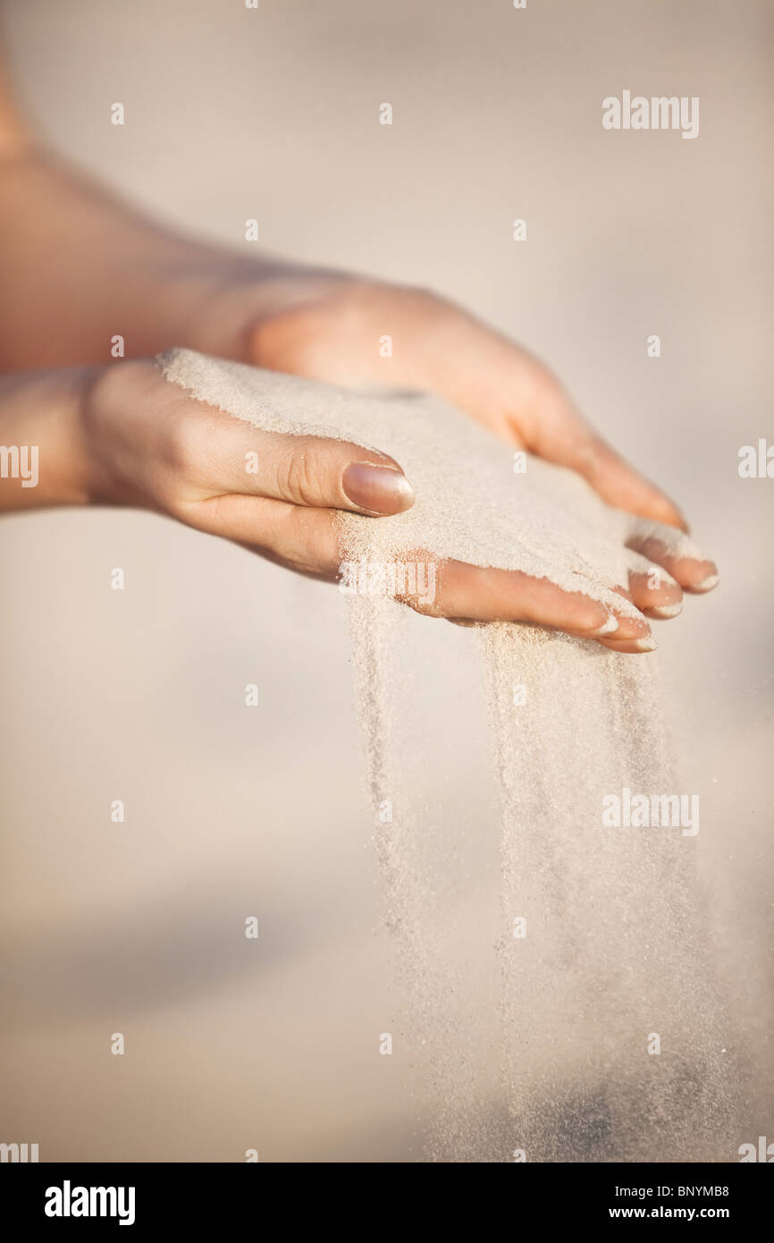 Hands In The Sand High Resolution Stock Photography and Images - Alamy