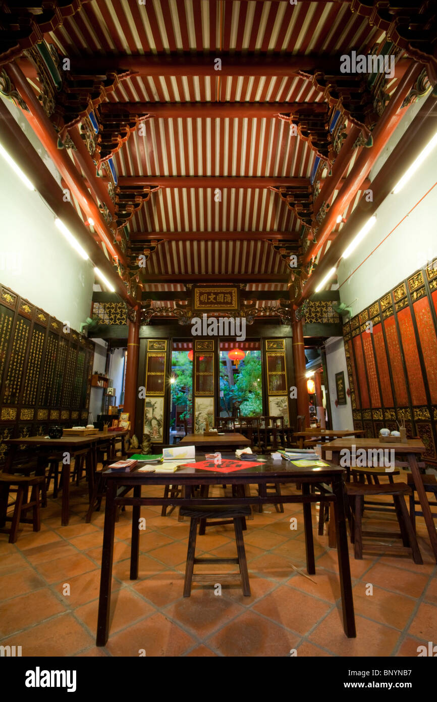 Peranakan style interior as seen from the entrance to a traditional ...