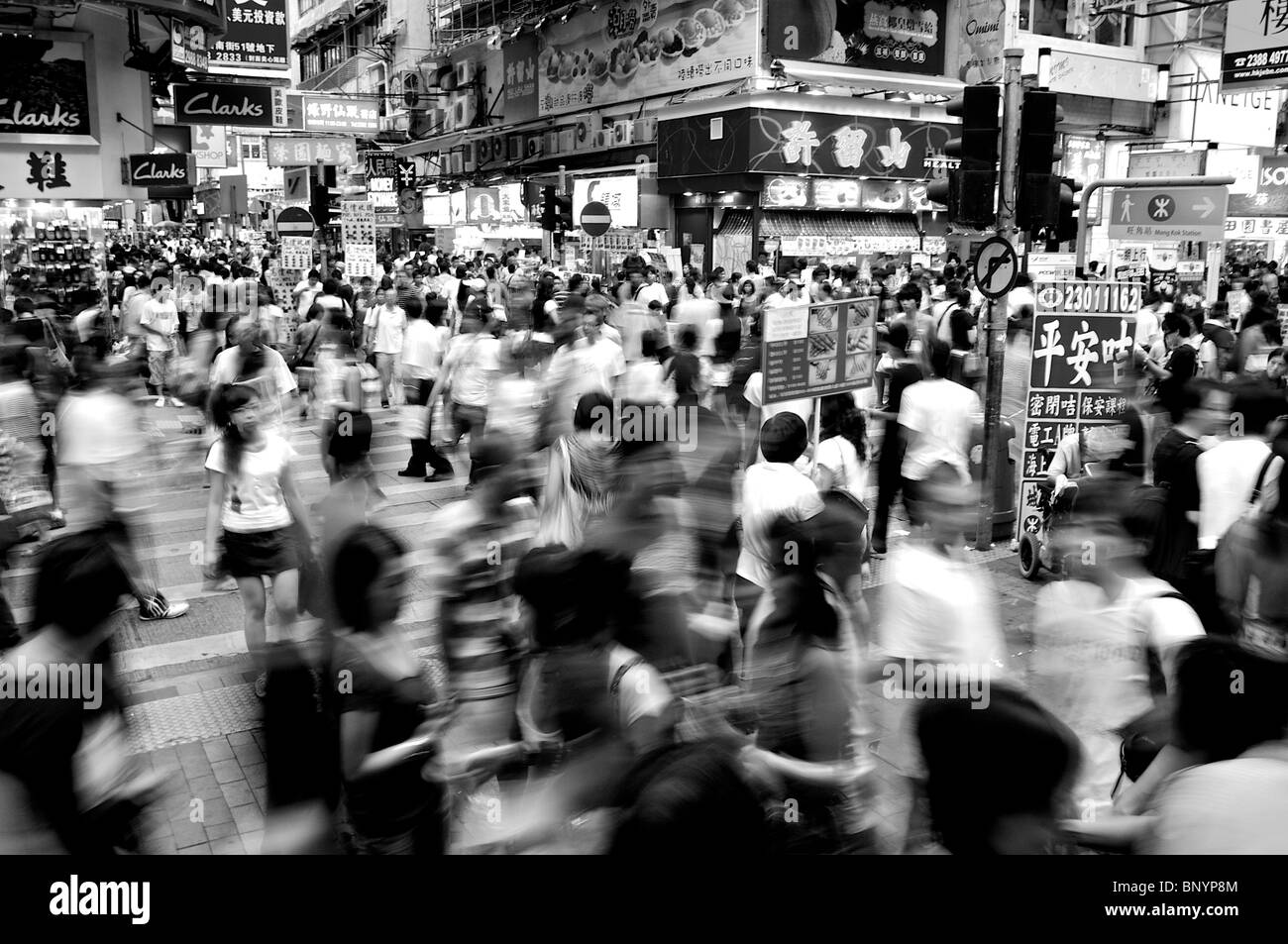 A crowded corner in Hong Kong close to Mong Kok station Stock Photo - Alamy
