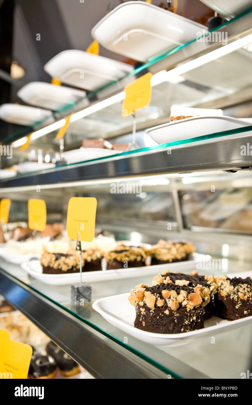 Pastries for sale in bakery display case Stock Photo - Alamy