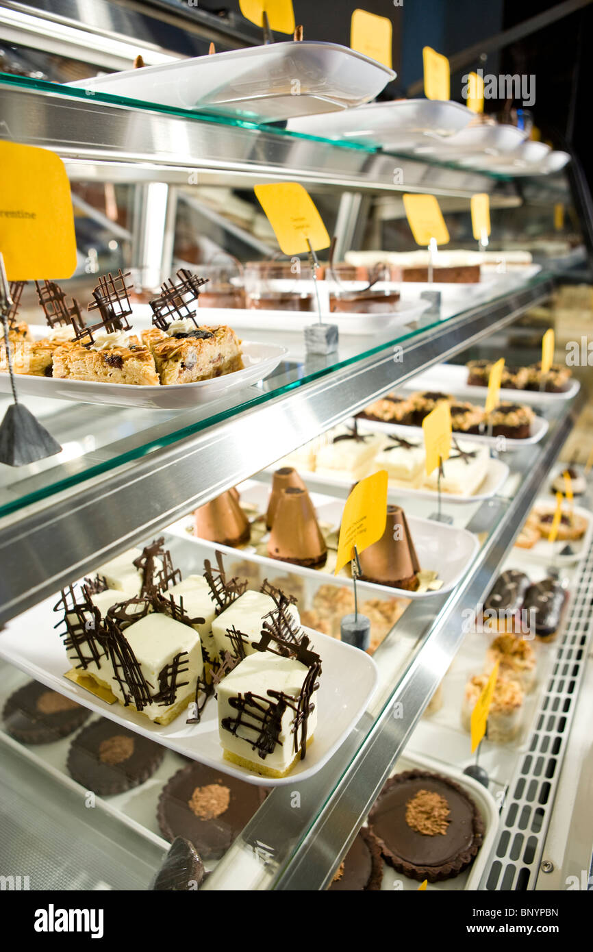Pastries for sale in bakery display case Stock Photo - Alamy