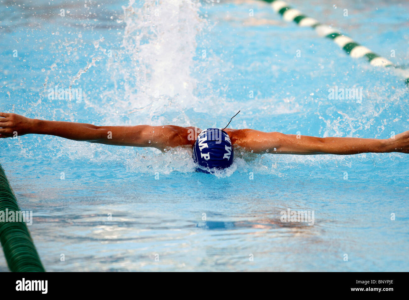 Man swimming - Butterfly Stock Photo - Alamy