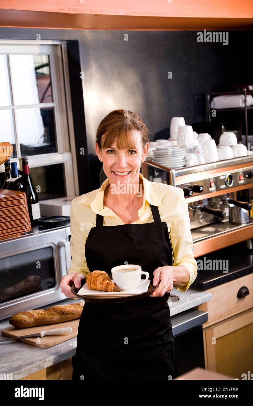 Waitress with customer order serving breakfast Stock Photo - Alamy
