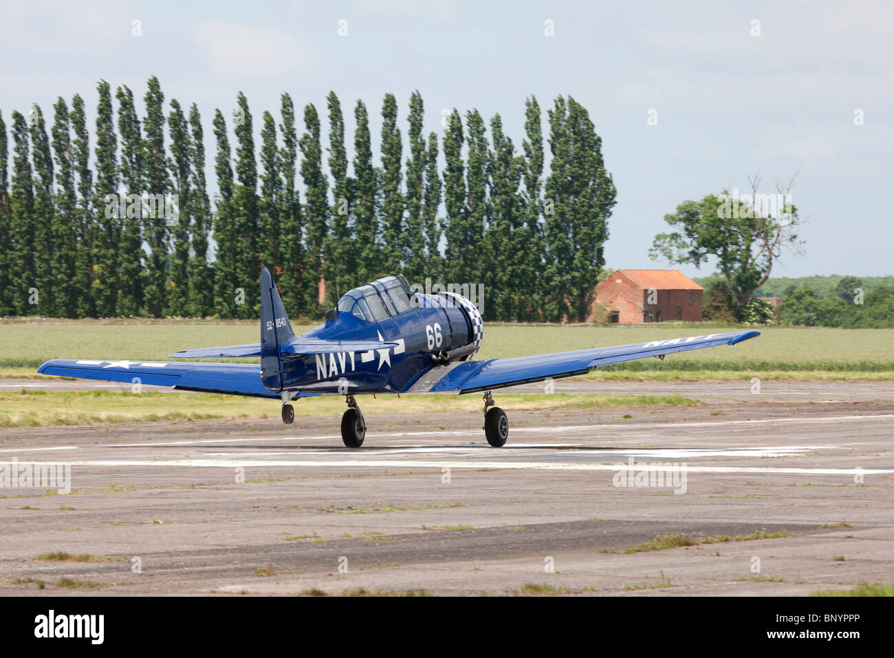 North American T6J Harvard 52-8453 66 Navy G-BUKY taking-off from ...
