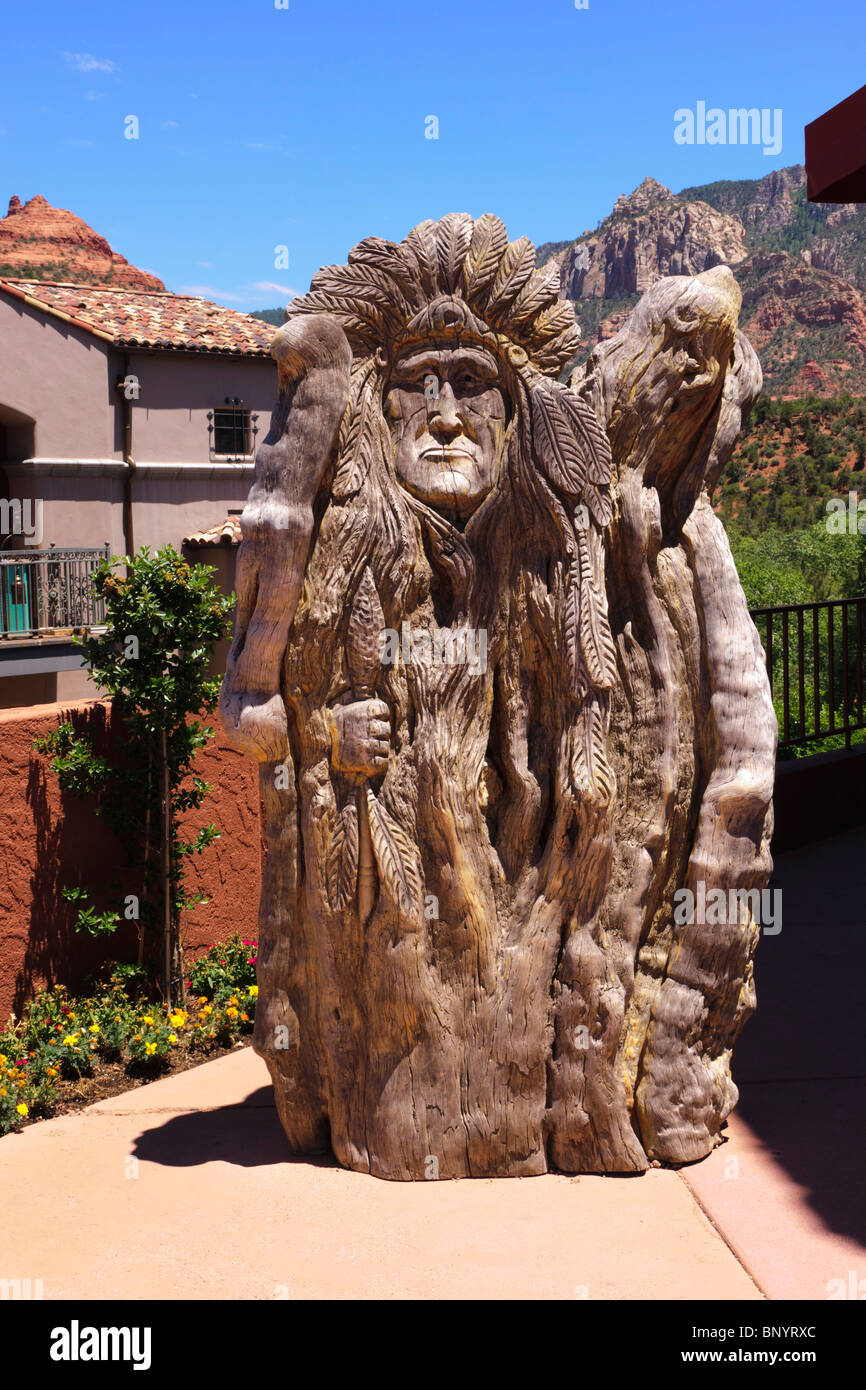 Sedona, Arizona - carved wooden Indian statue, from tree trunk Stock ...