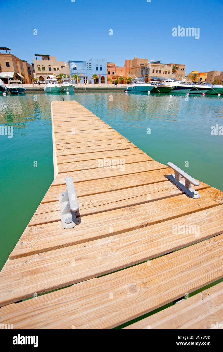 Small private wooden jetty in a tropical marina Stock Photo - Alamy