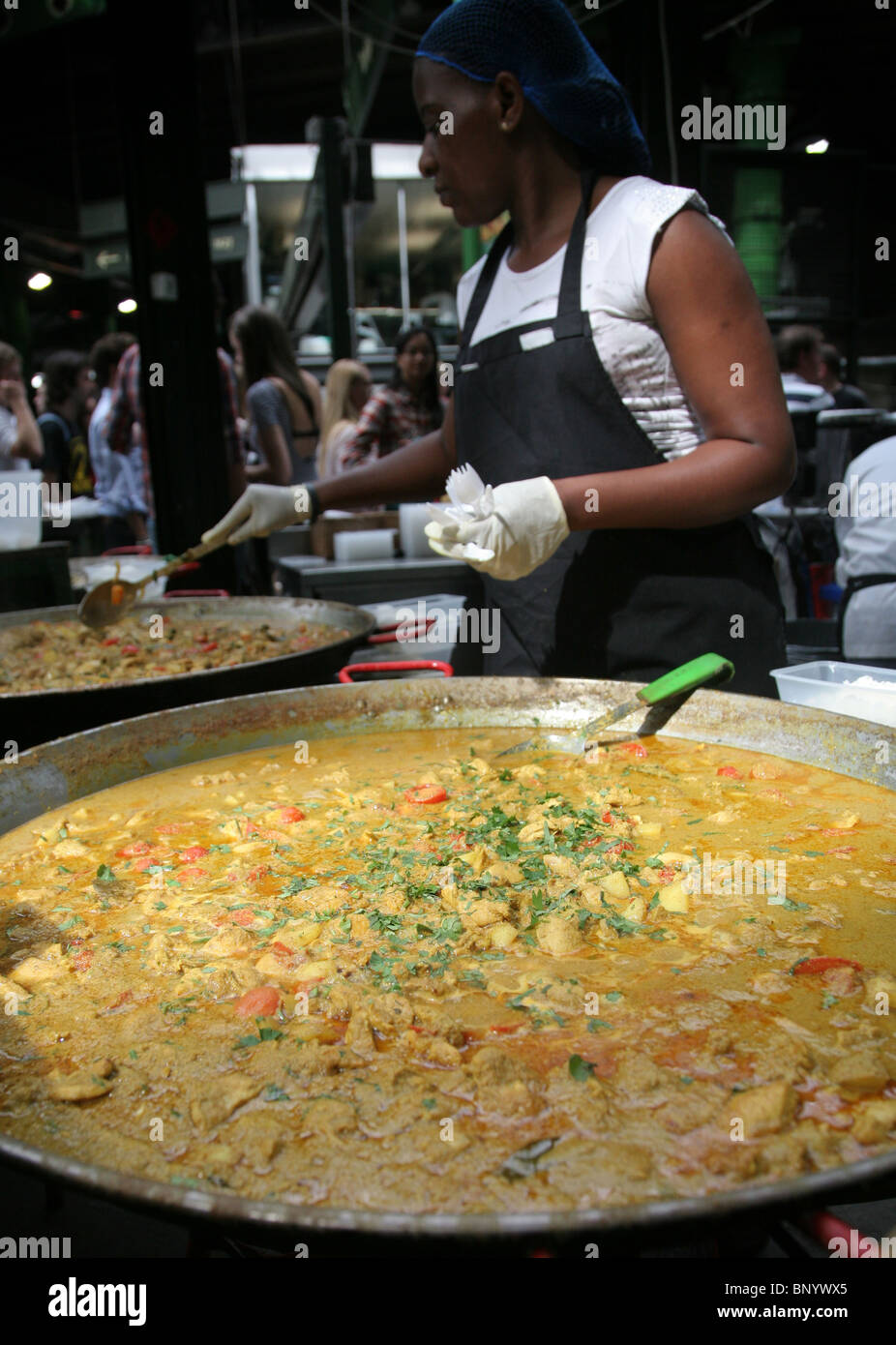 Curry being cooked at Borough Market, south east London, UK Stock Photo ...