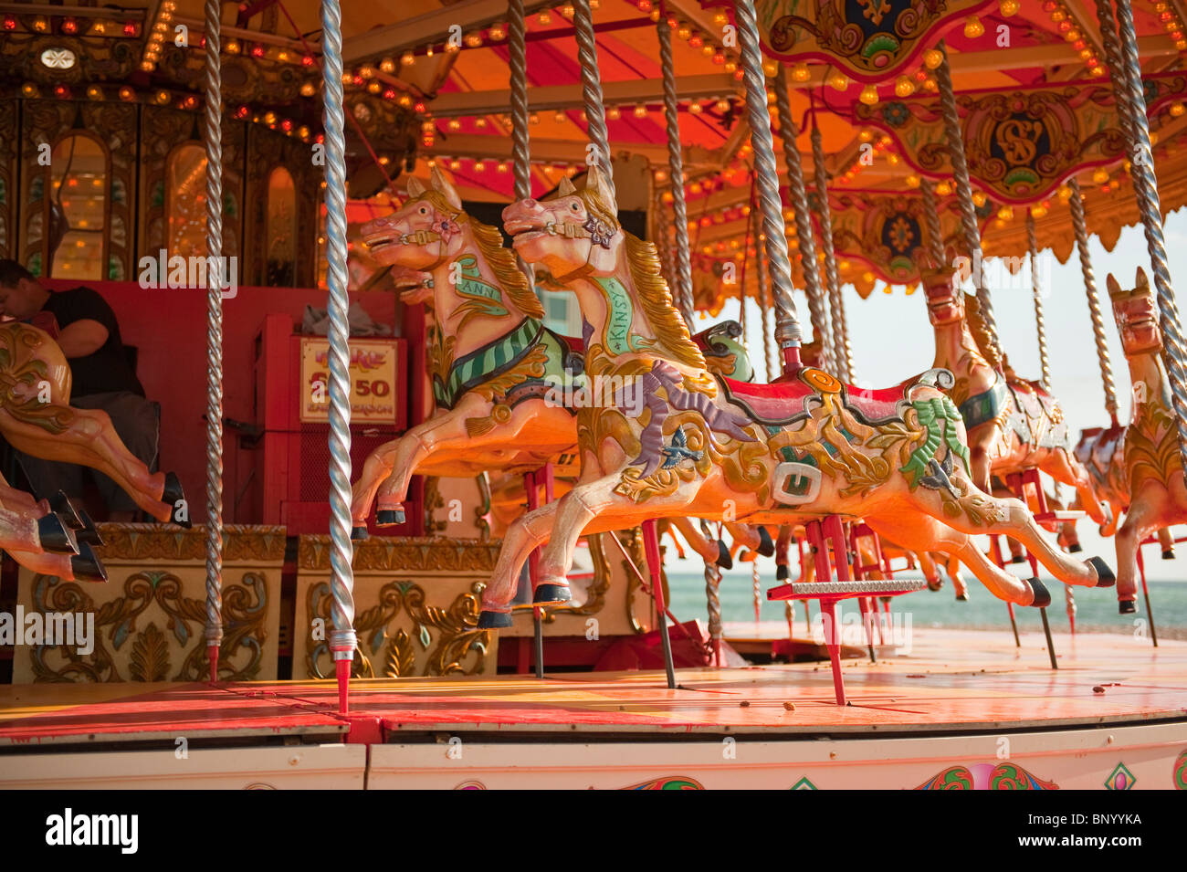 Fairground carousel, on Brighton's seafront Stock Photo - Alamy