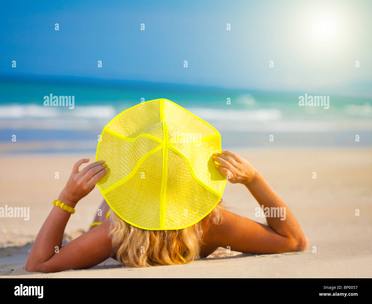 Woman yellow bikini beach hi-res stock photography and images - Alamy