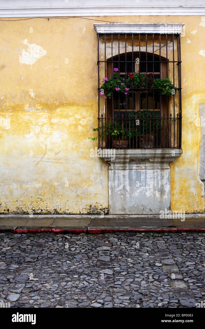 Typical decorative windows in the wall of a colonial style building in ...