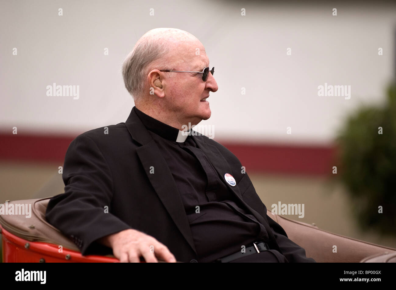A priest participating in the La Habra Corn Festival parade Stock Photo ...