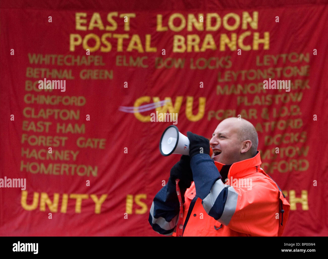 A striking Postal Worker picket outside Bow Delivery Office in East ...