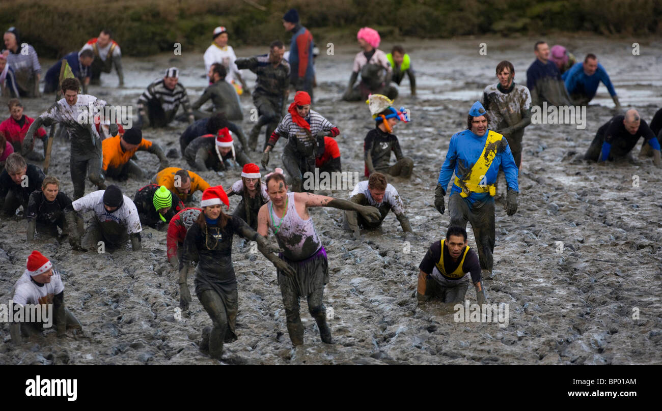 Mud covered Competitors near the finish line during the Maldon Mud Race. Picture by James ...