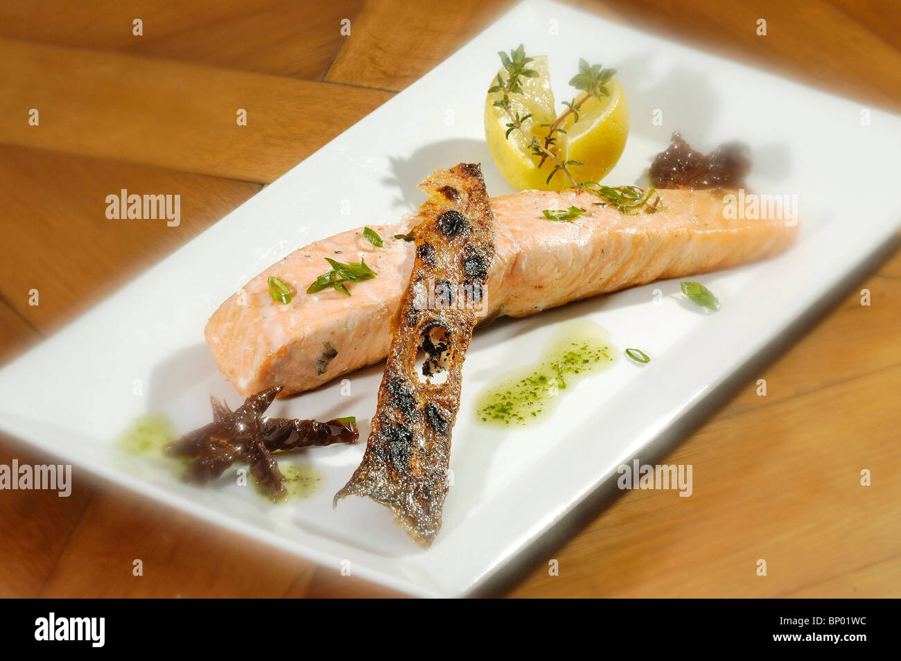 King salmon baked with lemon Stock Photo - Alamy