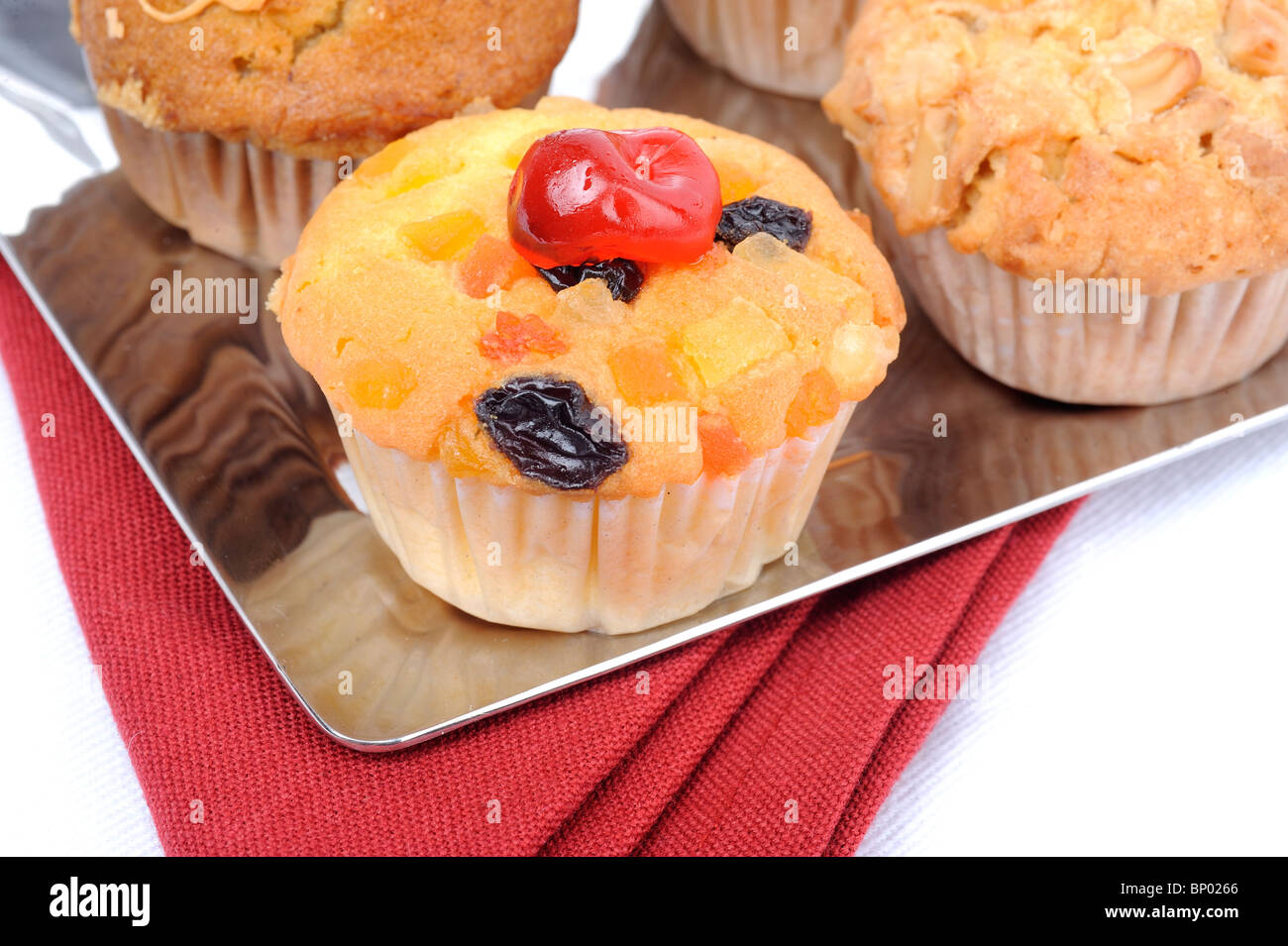 closeup of colorful muffins with cherry Stock Photo - Alamy