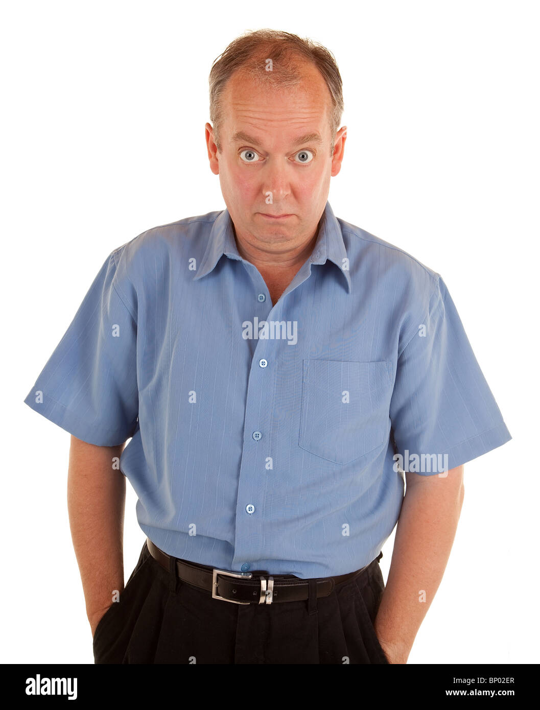 A standing serious man is looking at you Stock Photo - Alamy