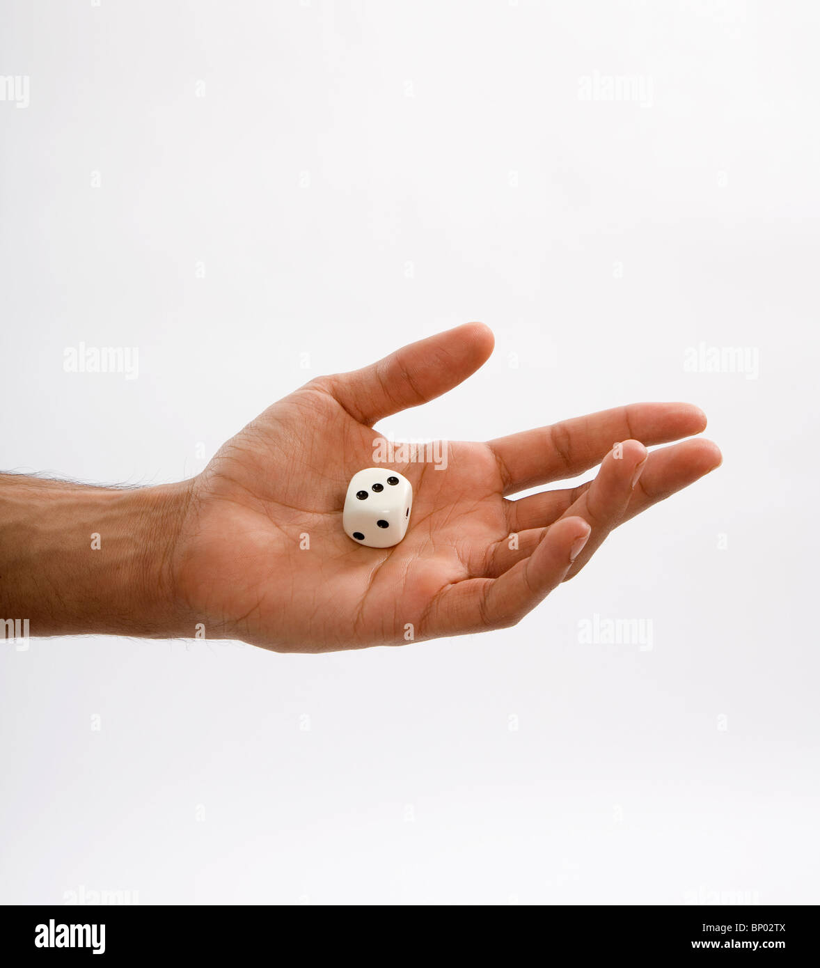 3 dice in hand hi-res stock photography and images - Alamy