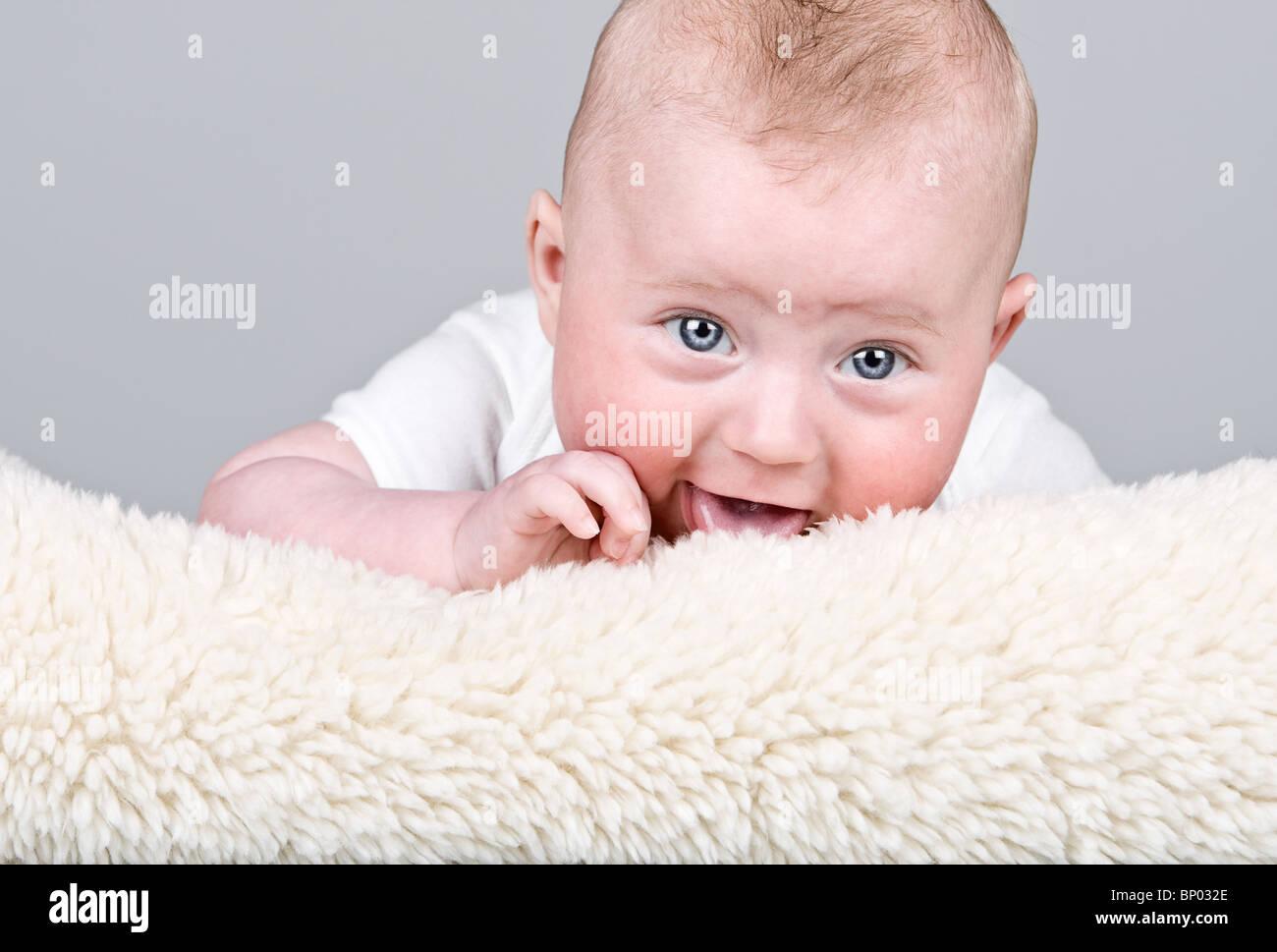 Shot of a Beautiful Baby Boy against a Grey Background Stock Photo - Alamy