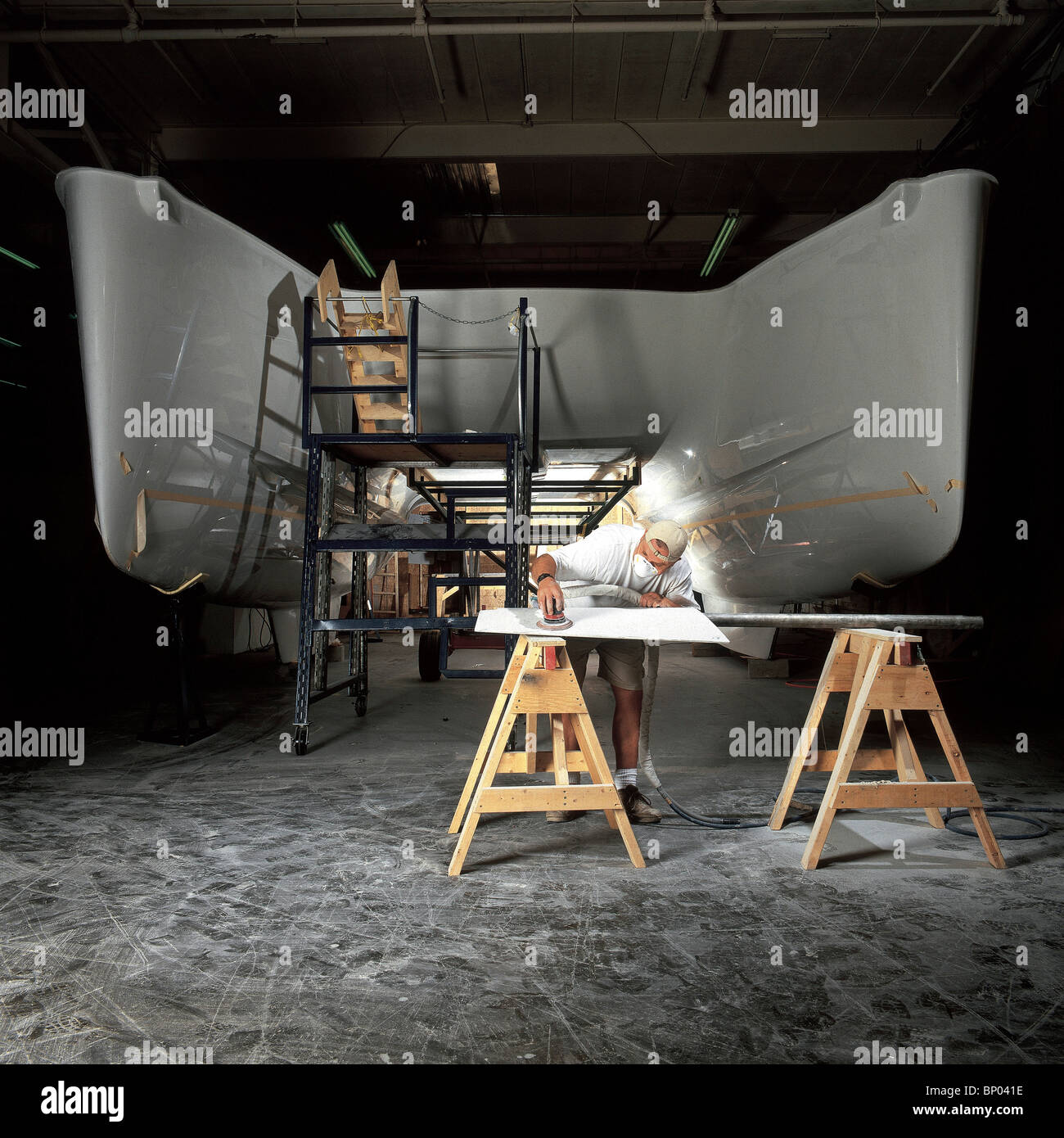 Man building a boat Stock Photo - Alamy