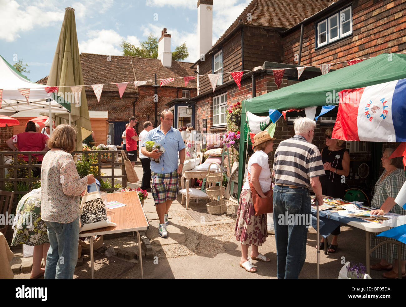 Shoppers at the French Farmers market, Elham village near Folkestone ...