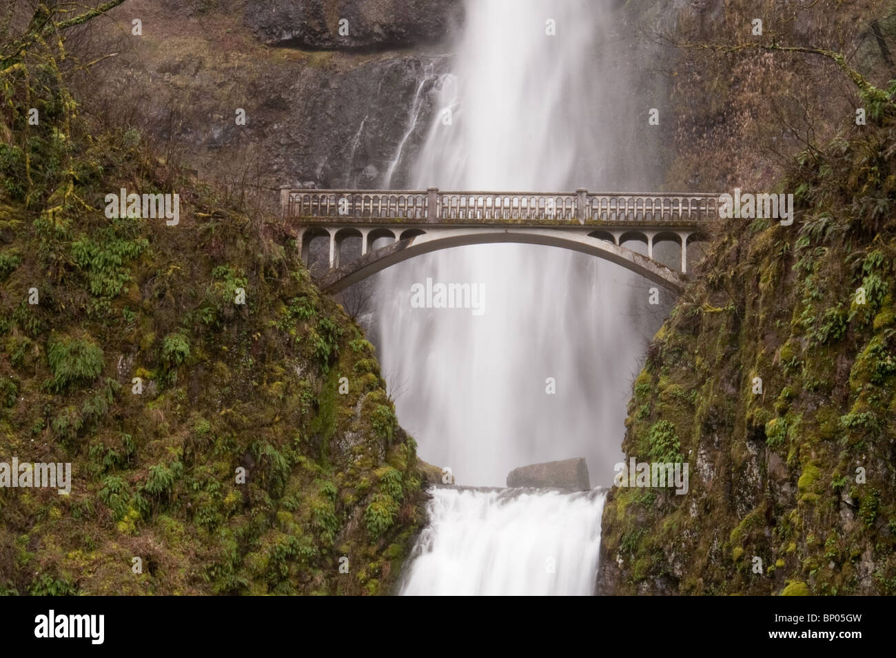 Tourists on the bridge at Multnomah Falls, the second highest year-round waterfall in the United ...