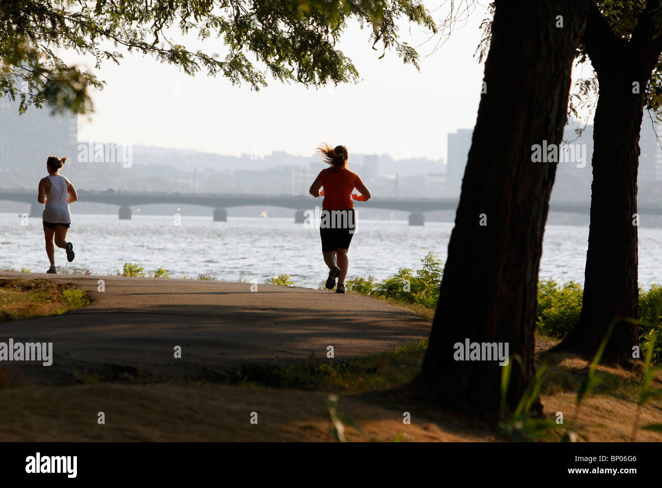 People jogging on the Esplanade along the Charles River, Boston ...