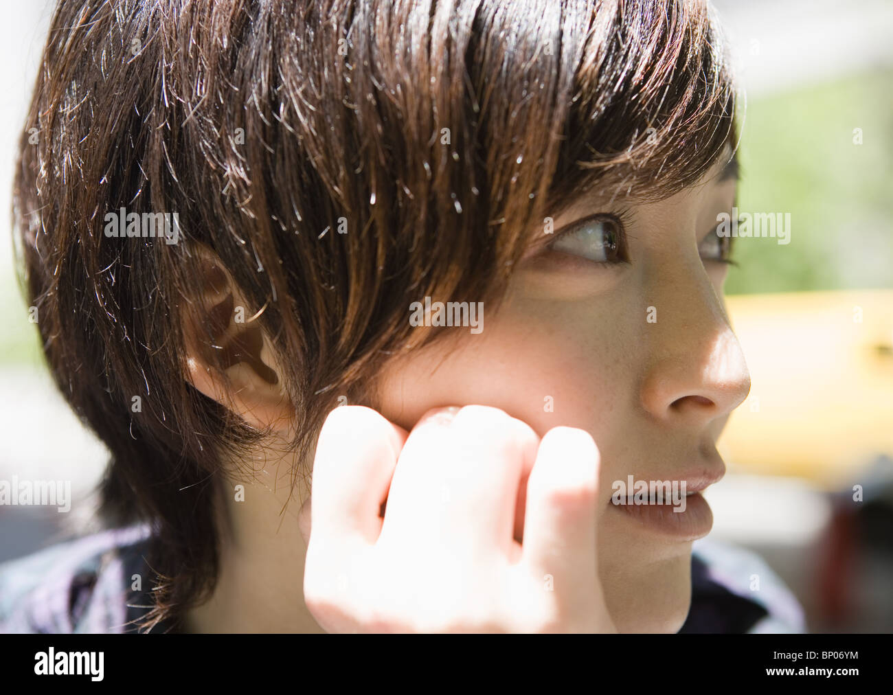 Putting hand on chin hi-res stock photography and images - Alamy