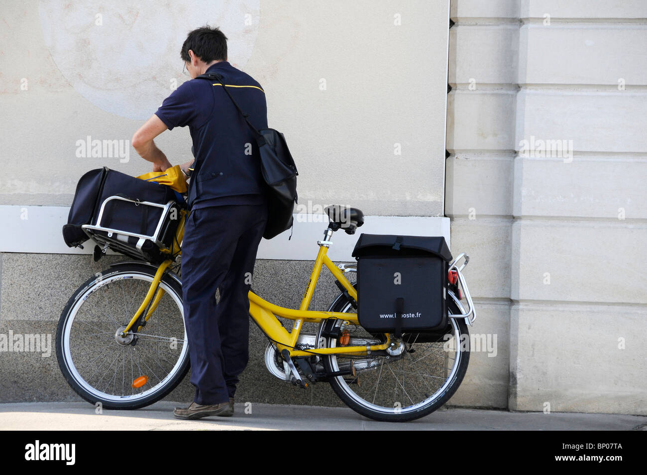 France, postman with bicycle Stock Photo - Alamy