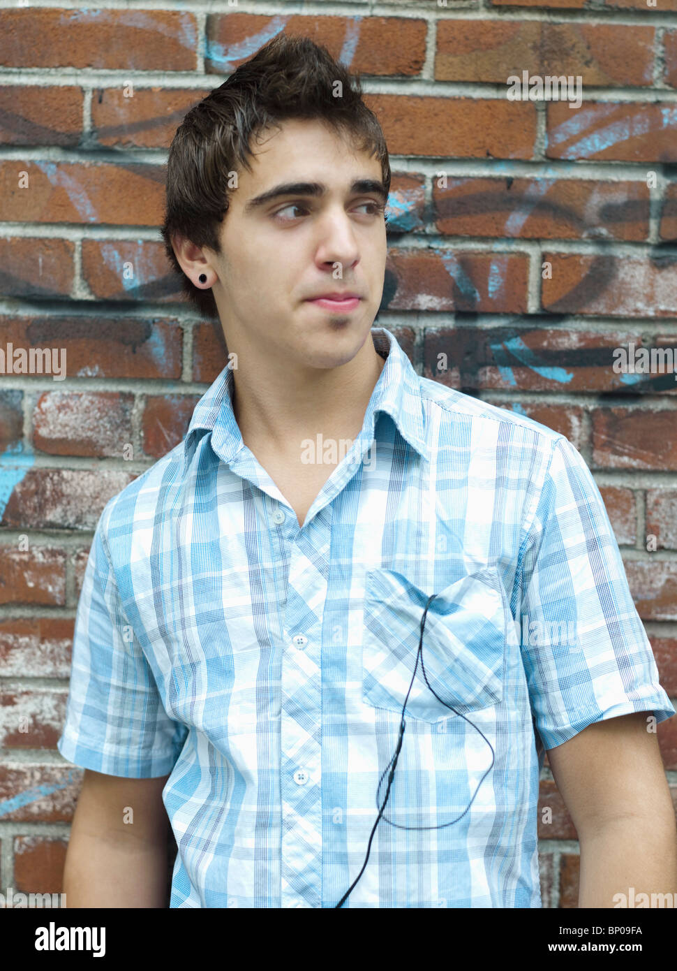 Teenage boy leaning against wall Stock Photo - Alamy Teenage boy leaning against wall Stock Photo - Alamy