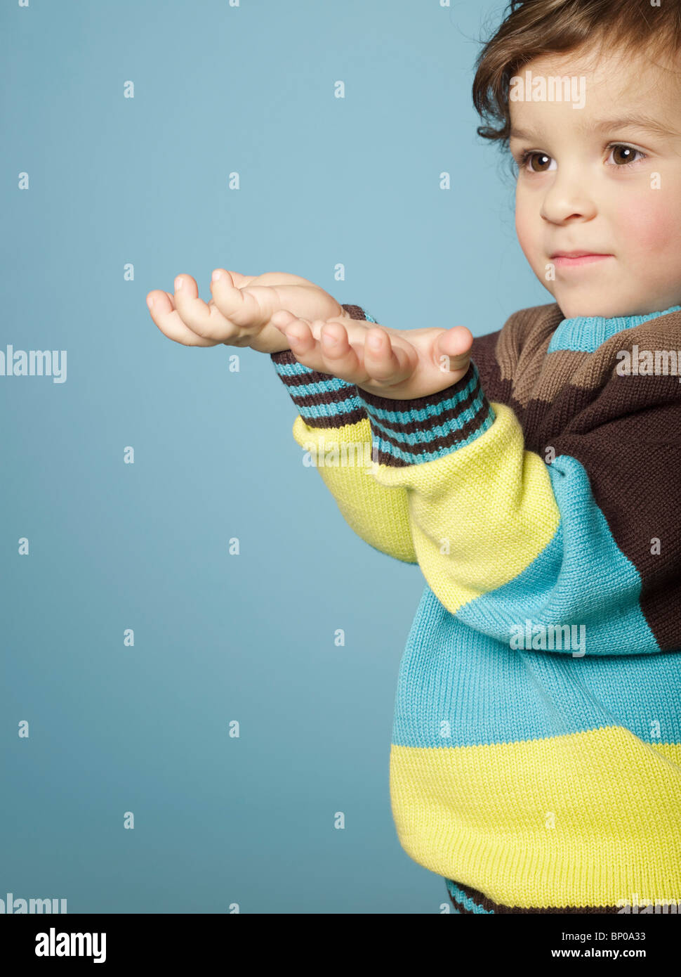 Little boy with hands outstretched Stock Photo - Alamy
