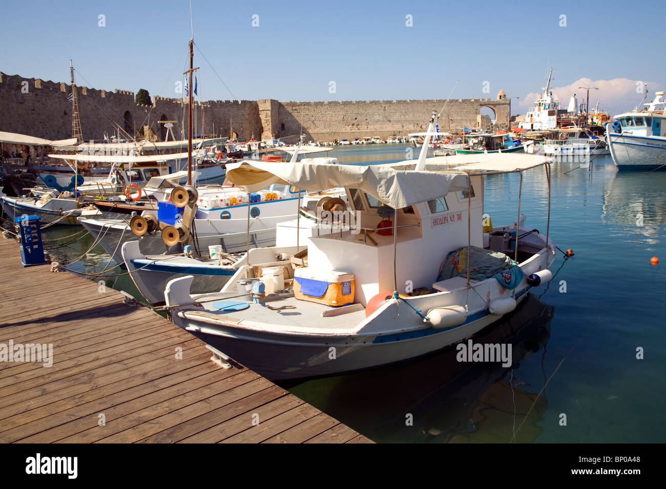 Boats in commercial harbour rhodes town hi-res stock photography and ...