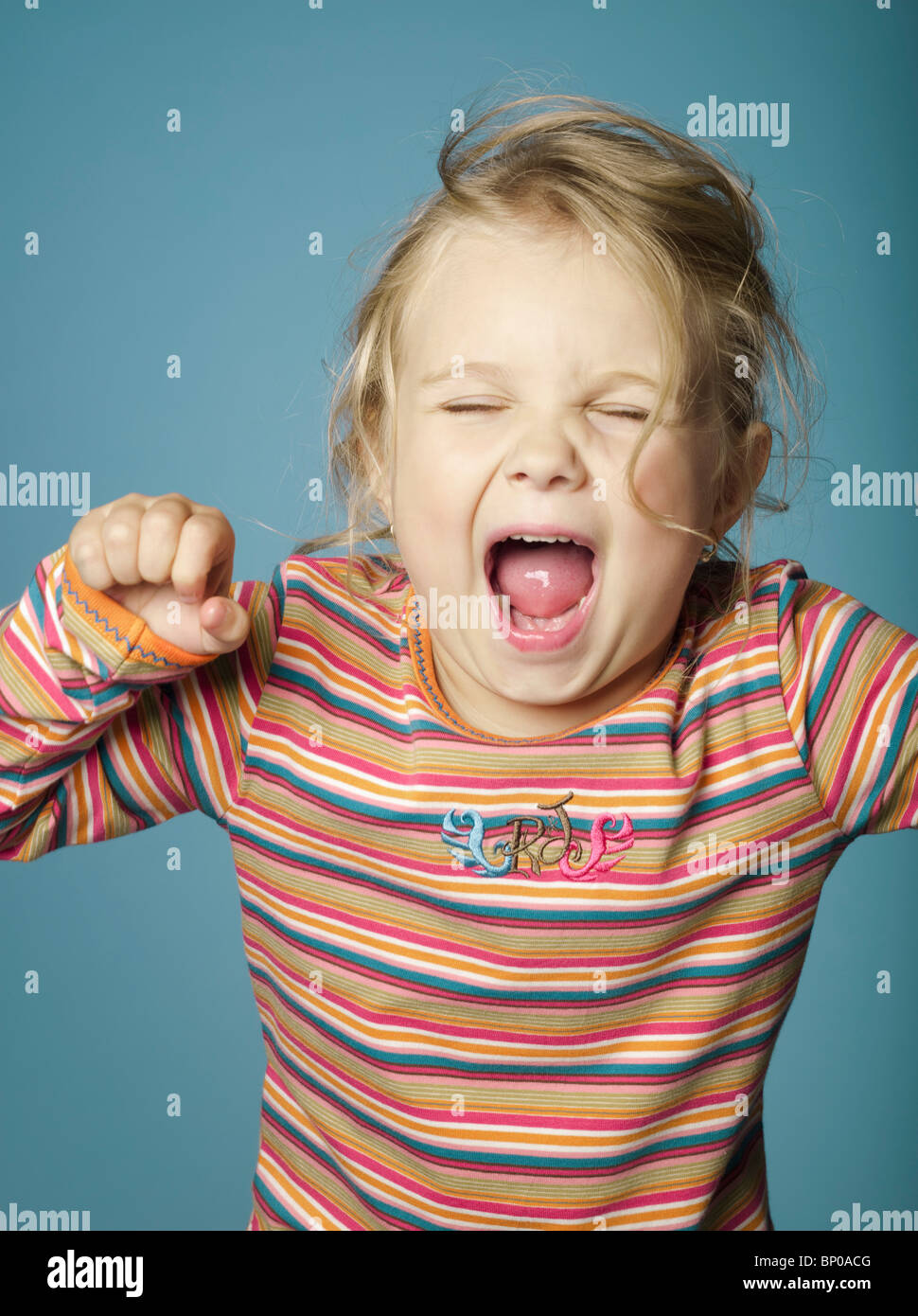 Portrait of little girl shouting Stock Photo - Alamy