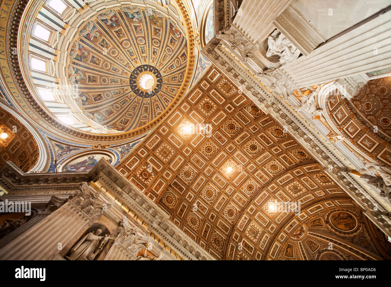 Heavy decorated ceiling inside the Saint Peter basilica Stock Photo - Alamy