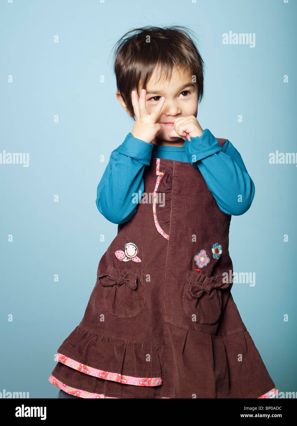 Shy little girl Stock Photo - Alamy