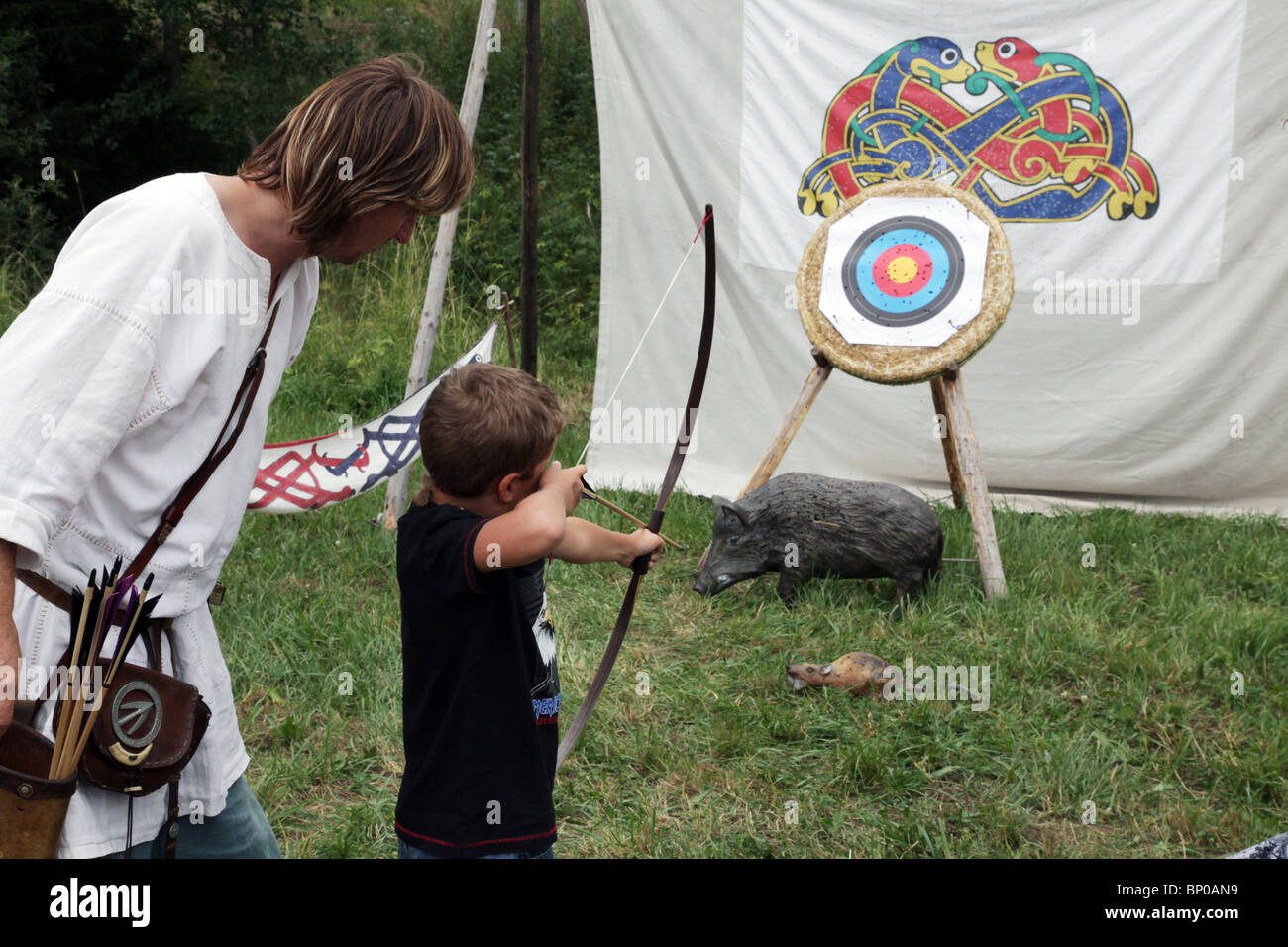 Boy shoots rubber pig at Finland's biggest Viking Market Festival and ...
