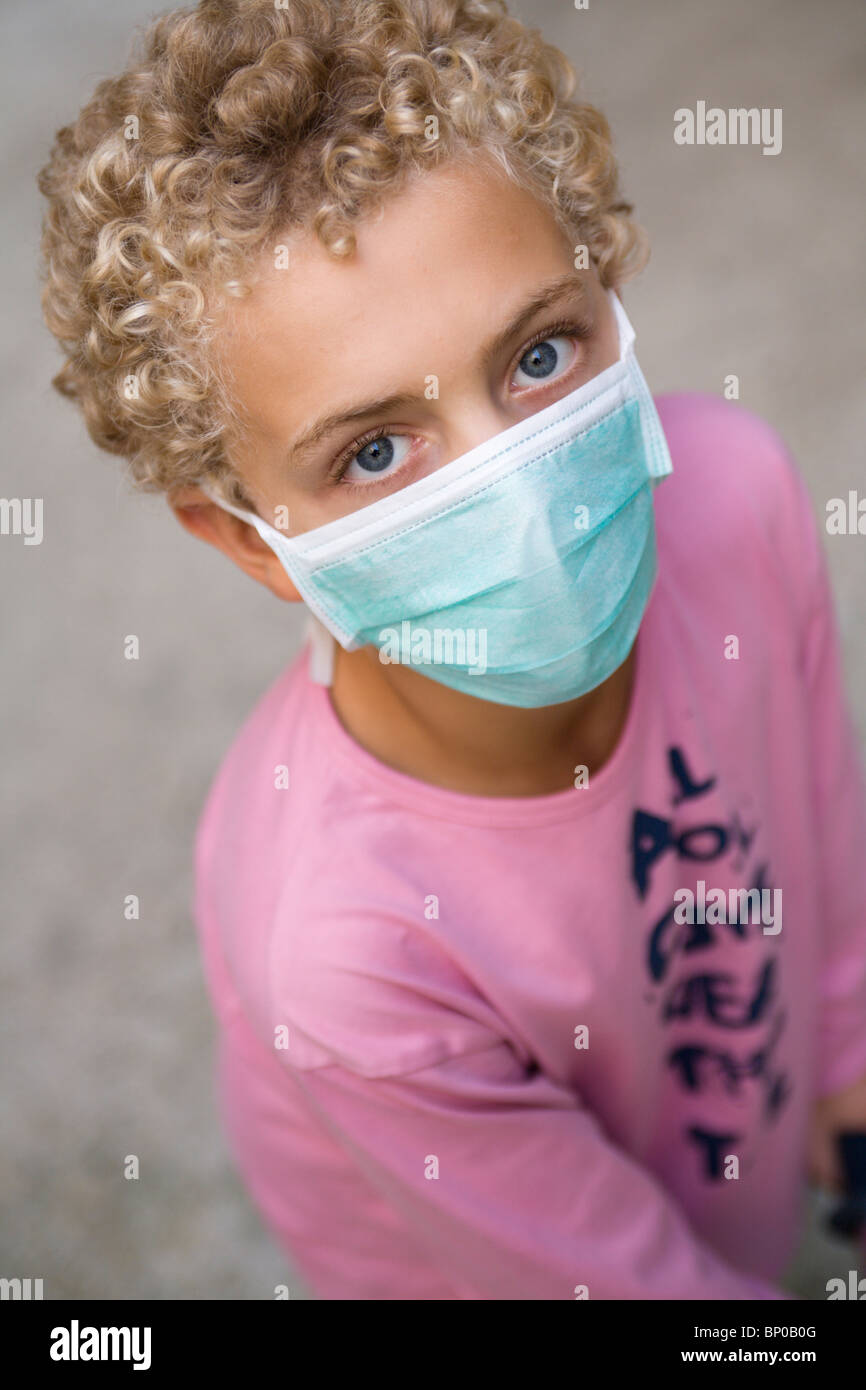 Boy with swine flu mask Stock Photo - Alamy