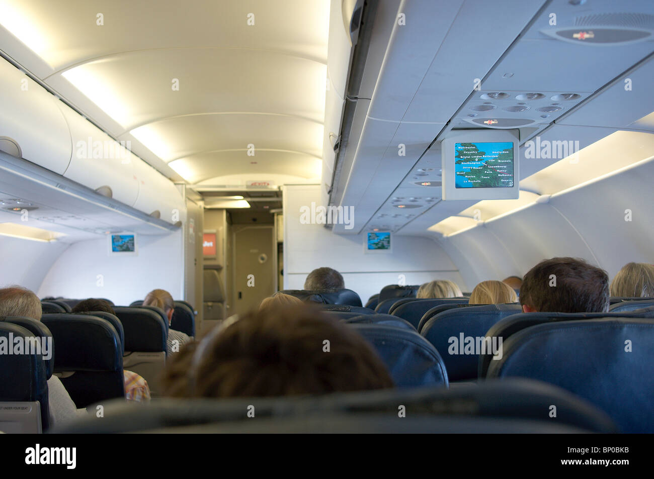 Airbus A321cabin and overhead TFT screen Stock Photo - Alamy